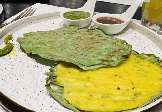 Corn Panki - corn puree with spices cooked between banana leaves
